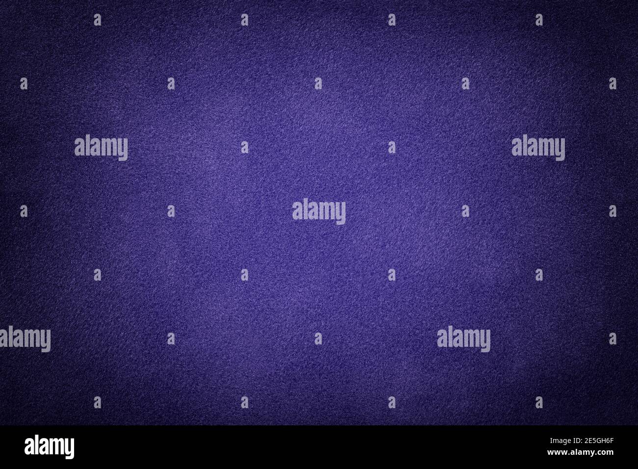 Navy blue matte background of suede fabric with vignette, closeup ...