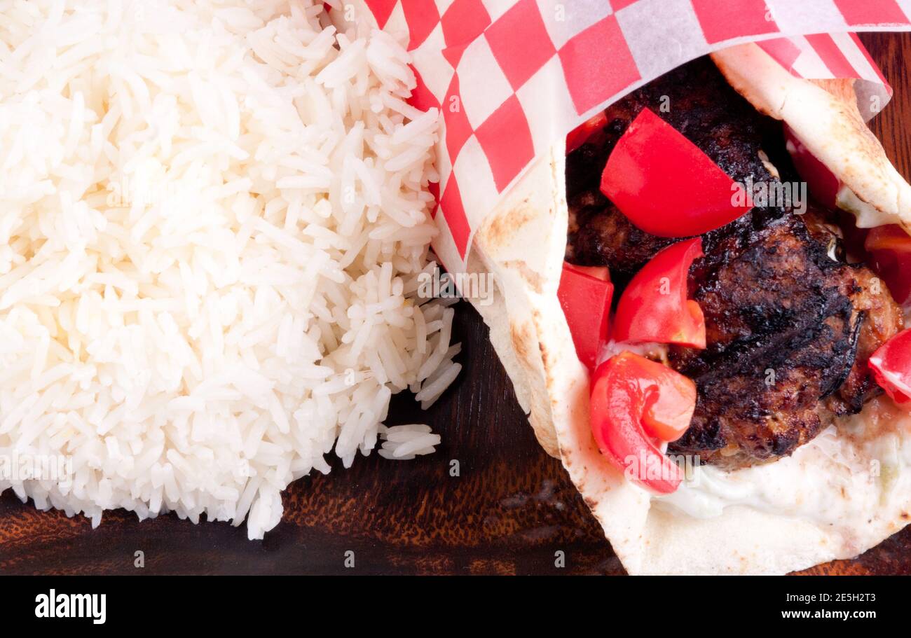 lean ground lamb gyro with rice and peas Stock Photo - Alamy