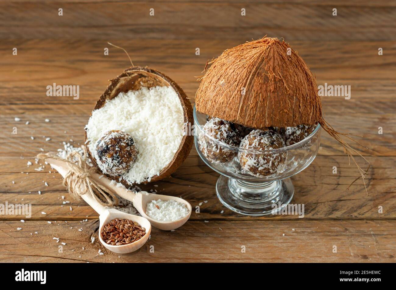 Healthy food concept. Homemade coconut energy balls in cocnut shell on ...