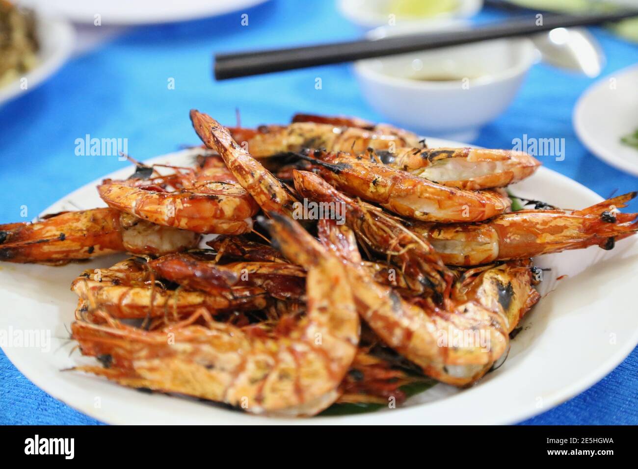 Grilled tiger prawns on a Vietnamese street food market Stock Photo - Alamy