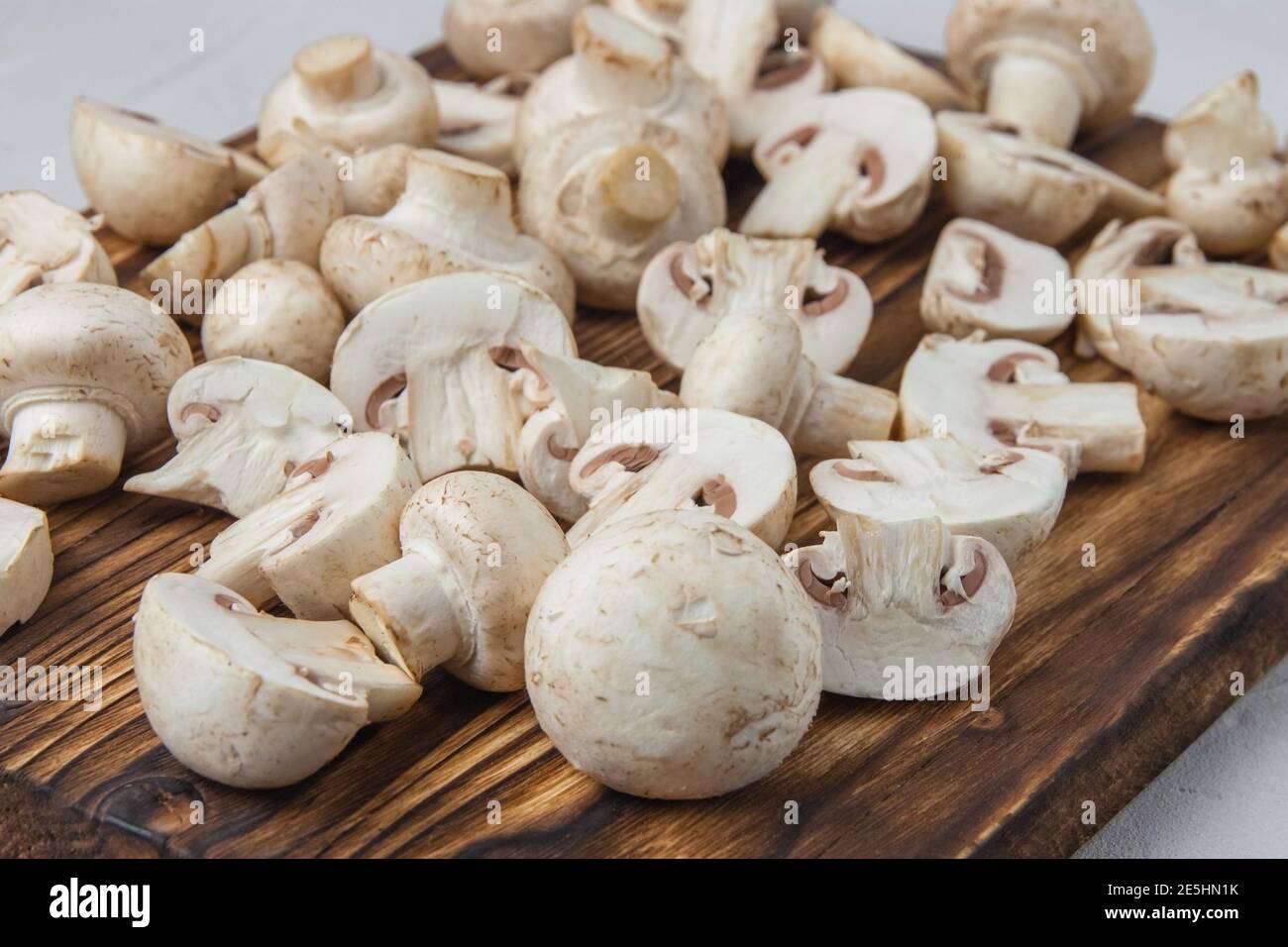 Whole sliced up champignons hi-res stock photography and images - Alamy
