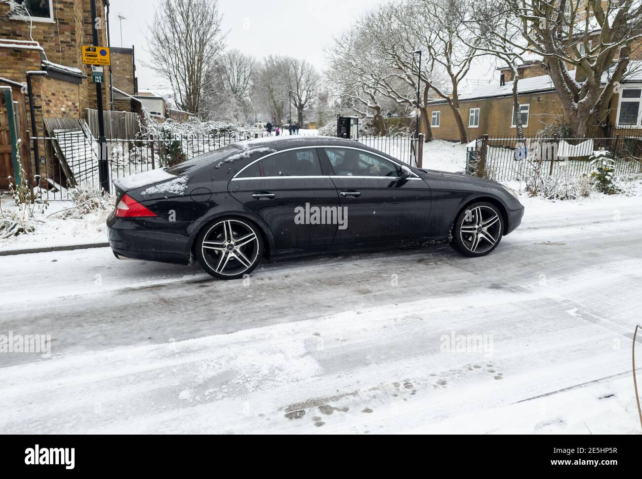 A rare snowfall in London making difficult driving conditions Stock ...