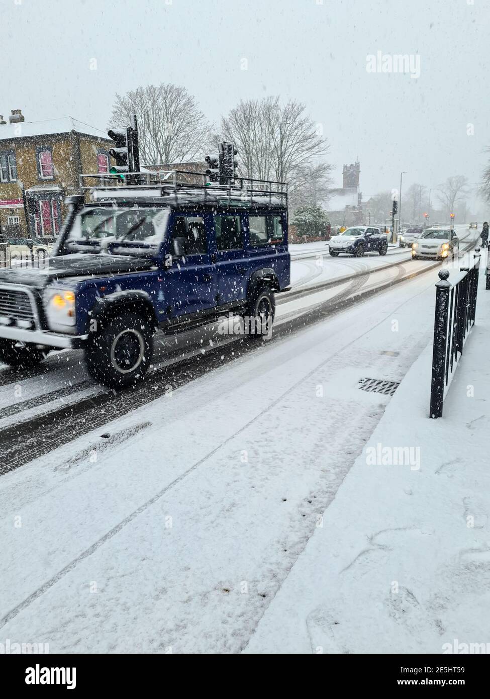 A rare snowfall in London making difficult driving conditions Stock ...