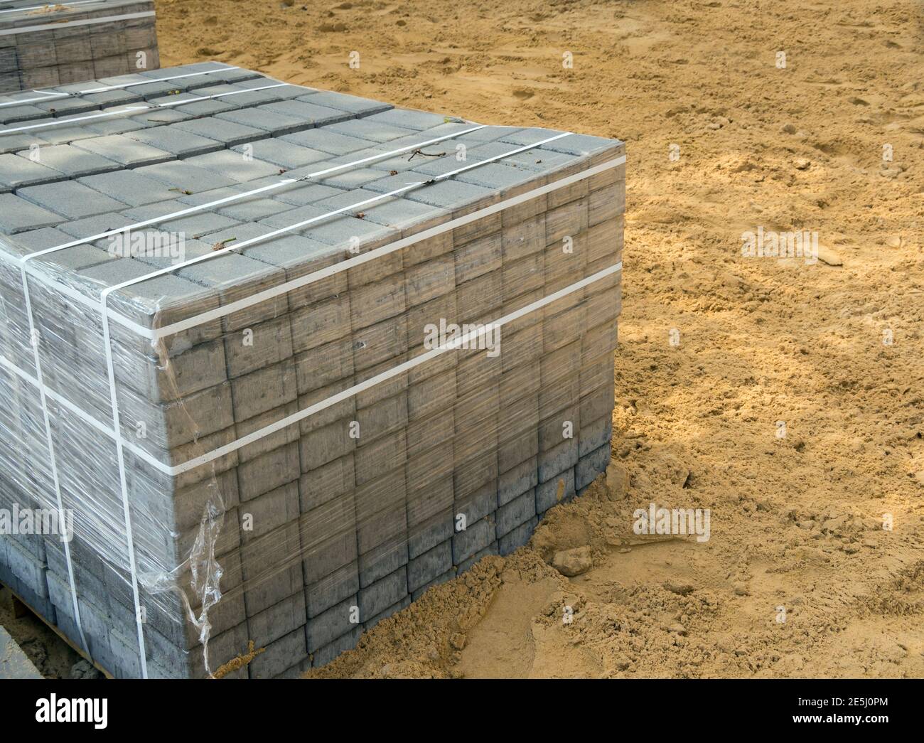 Packaging curb stone at the construction site Stock Photo - Alamy