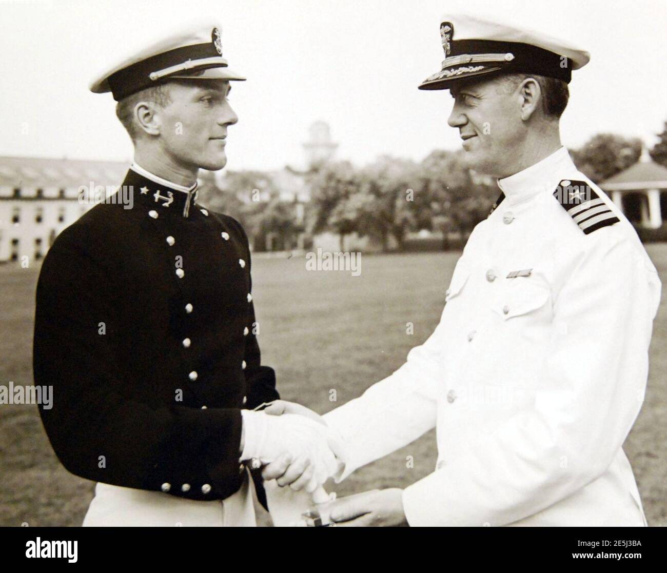 Midshipman William C. Chapman receives prize from Commander Ed A. Hayes ...