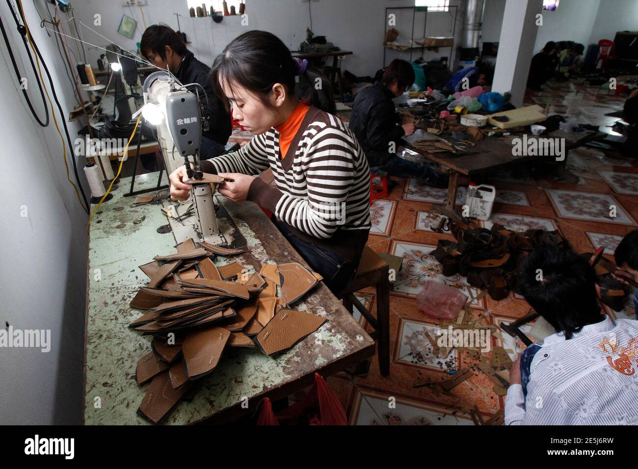 Vietnam factory shoes hi-res stock photography and images - Alamy