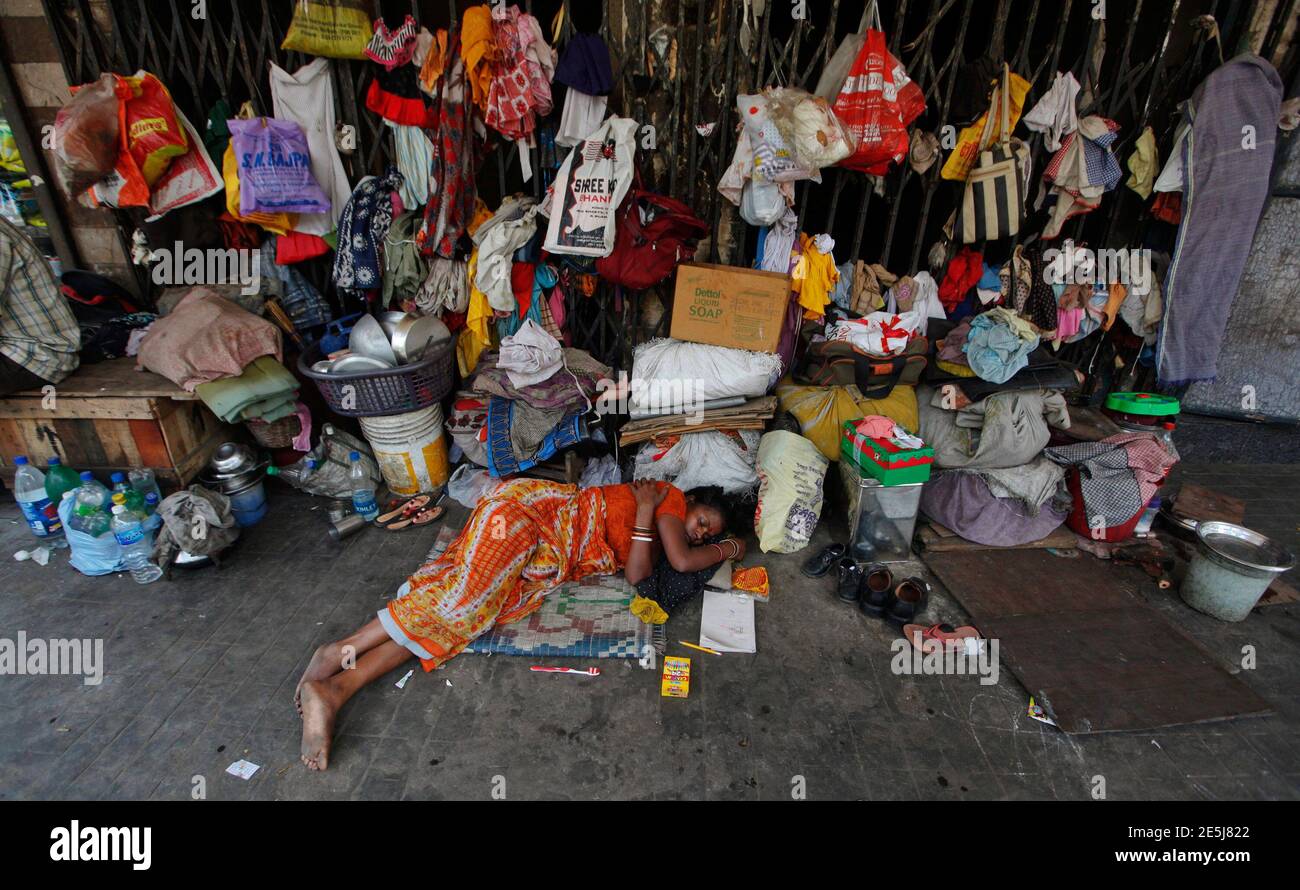 Homeless woman barefoot hi-res stock photography and images - Alamy