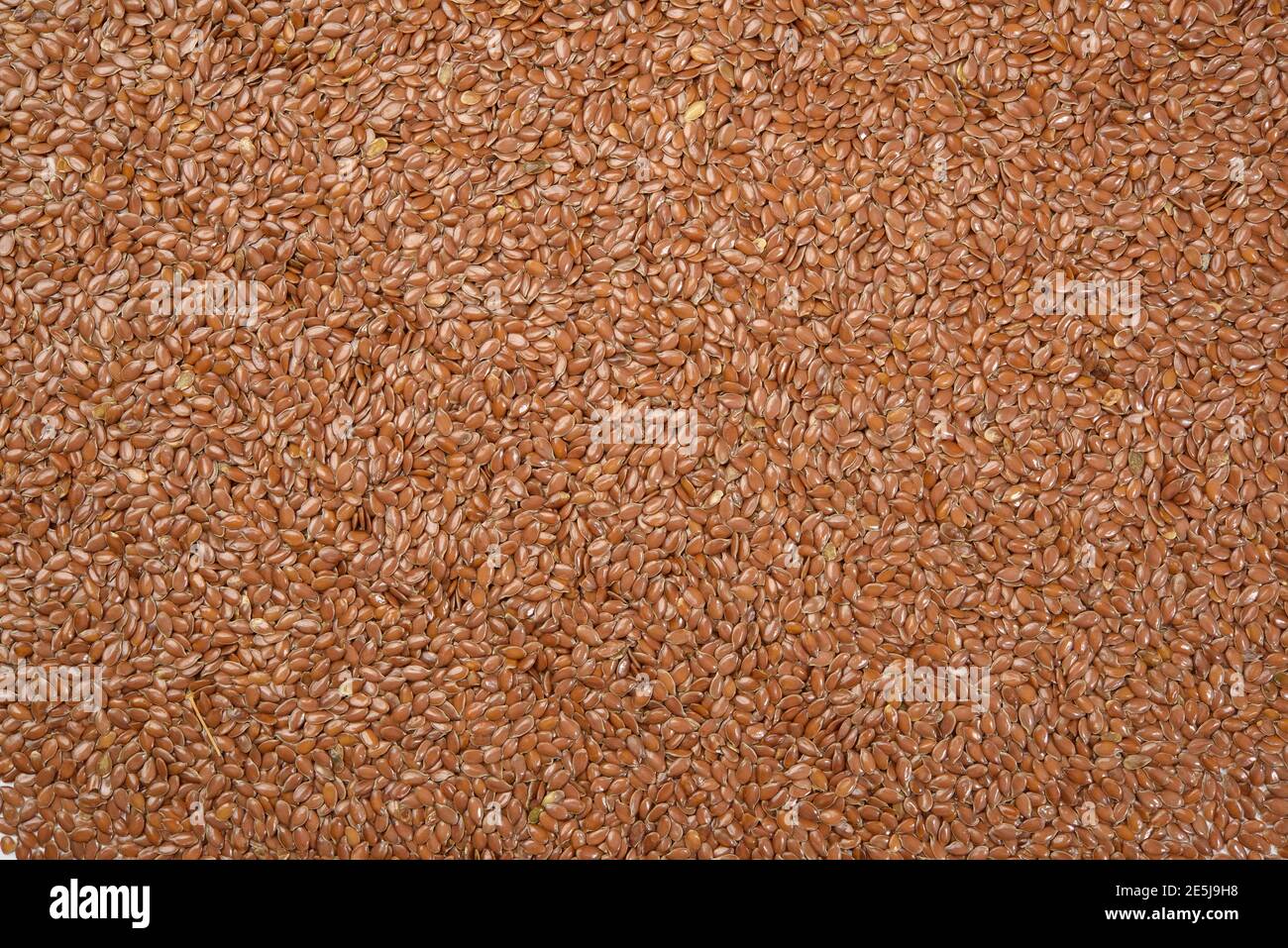 texture of dry brown flax seeds, top view, full frame Stock Photo - Alamy