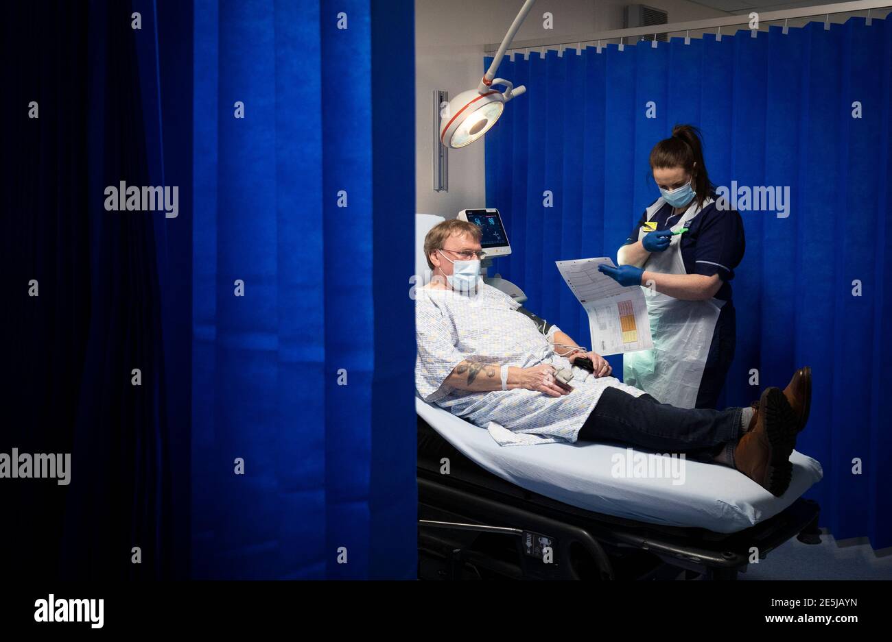 Patient James Coyle receives care, following a heart attack, in the ...