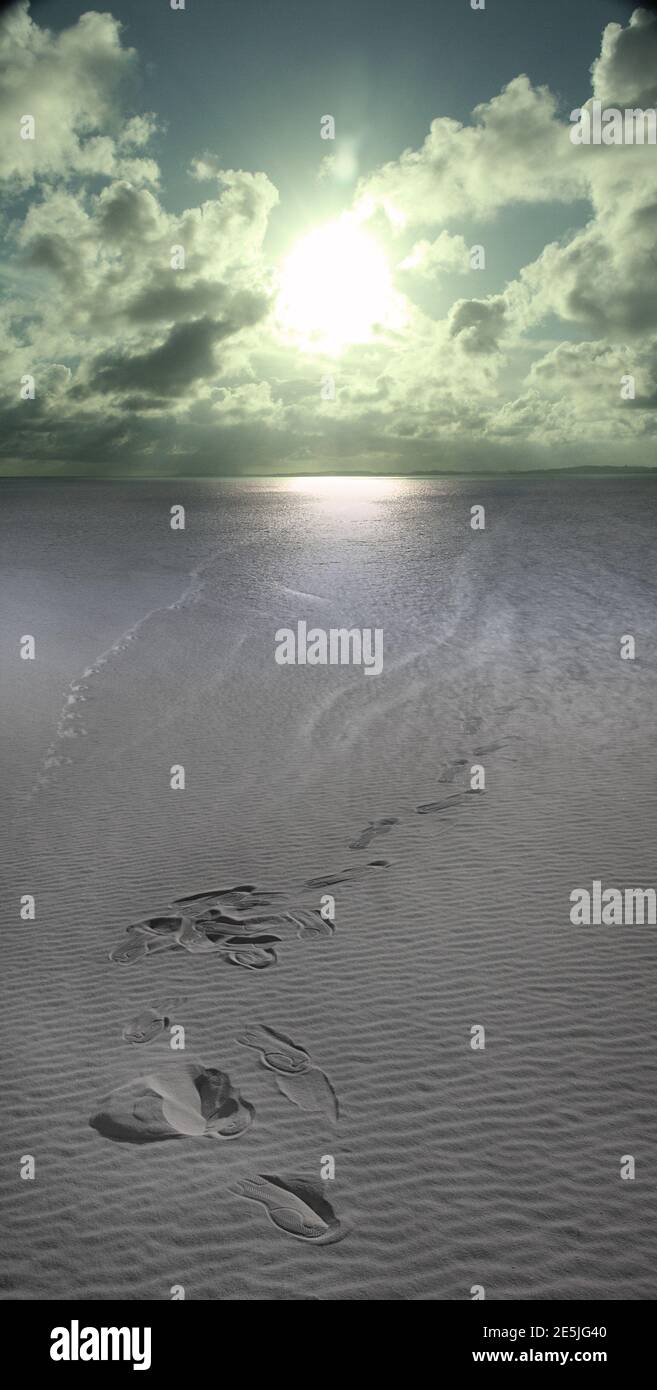 Surreal nature. Sand and ocean, beautiful sunset Stock Photo - Alamy