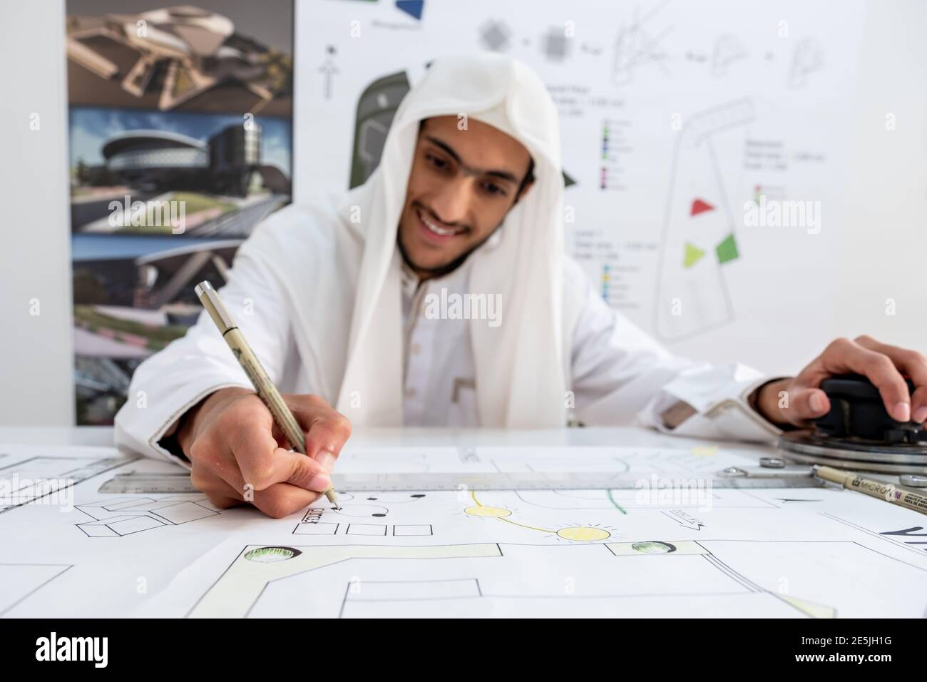 Focused arab architect working on a new project Stock Photo - Alamy
