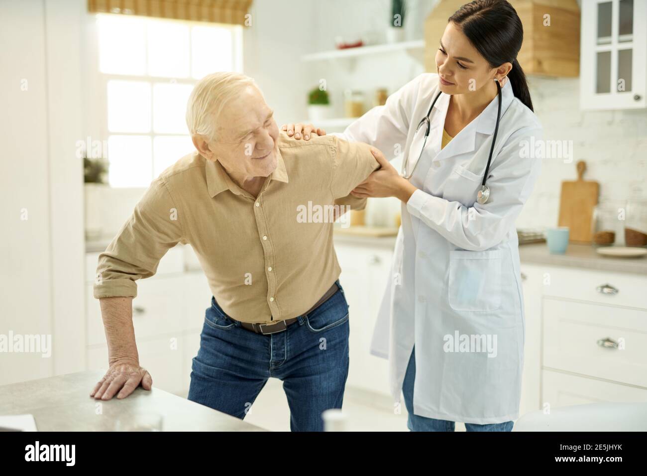 Woman getting up from chair hi-res stock photography and images - Alamy