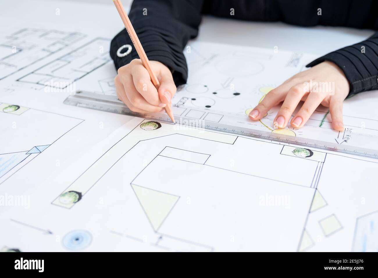Architect hands with pen and ruler Stock Photo - Alamy
