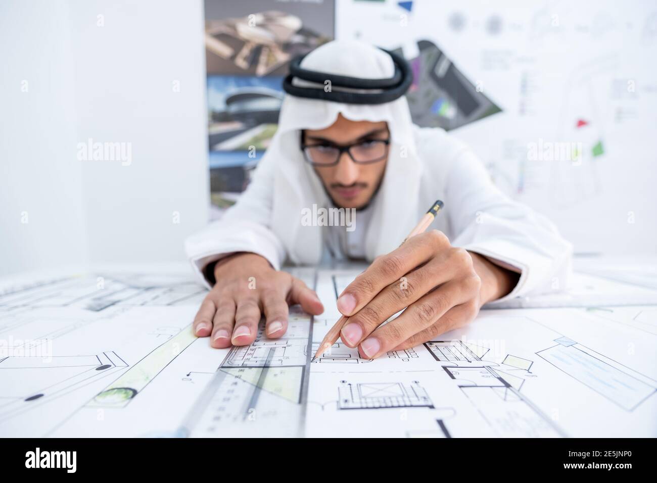 Male architect student making a sketch Stock Photo - Alamy