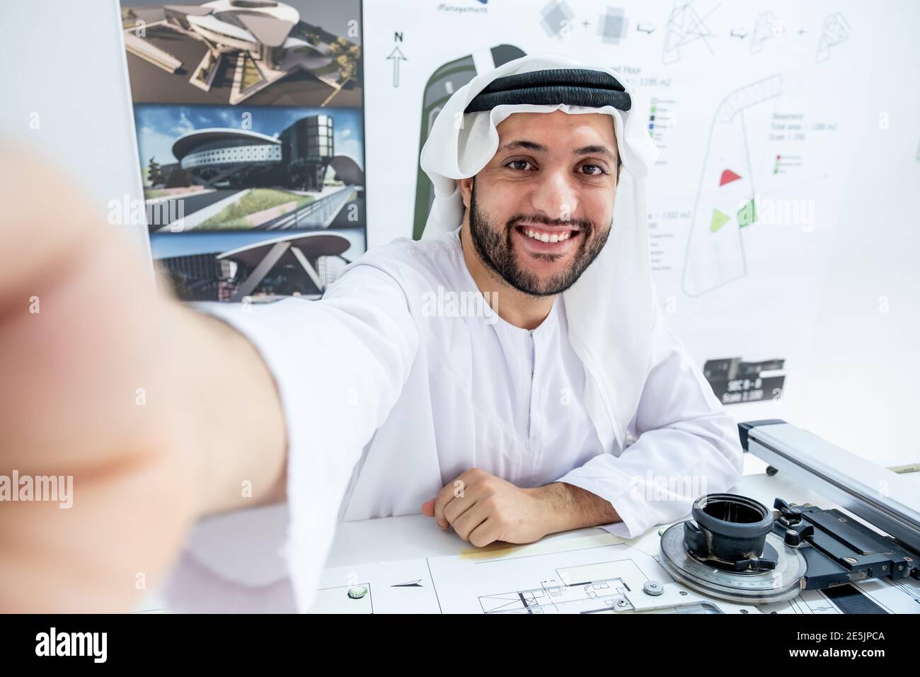 Arab male architect taking selfie Stock Photo - Alamy