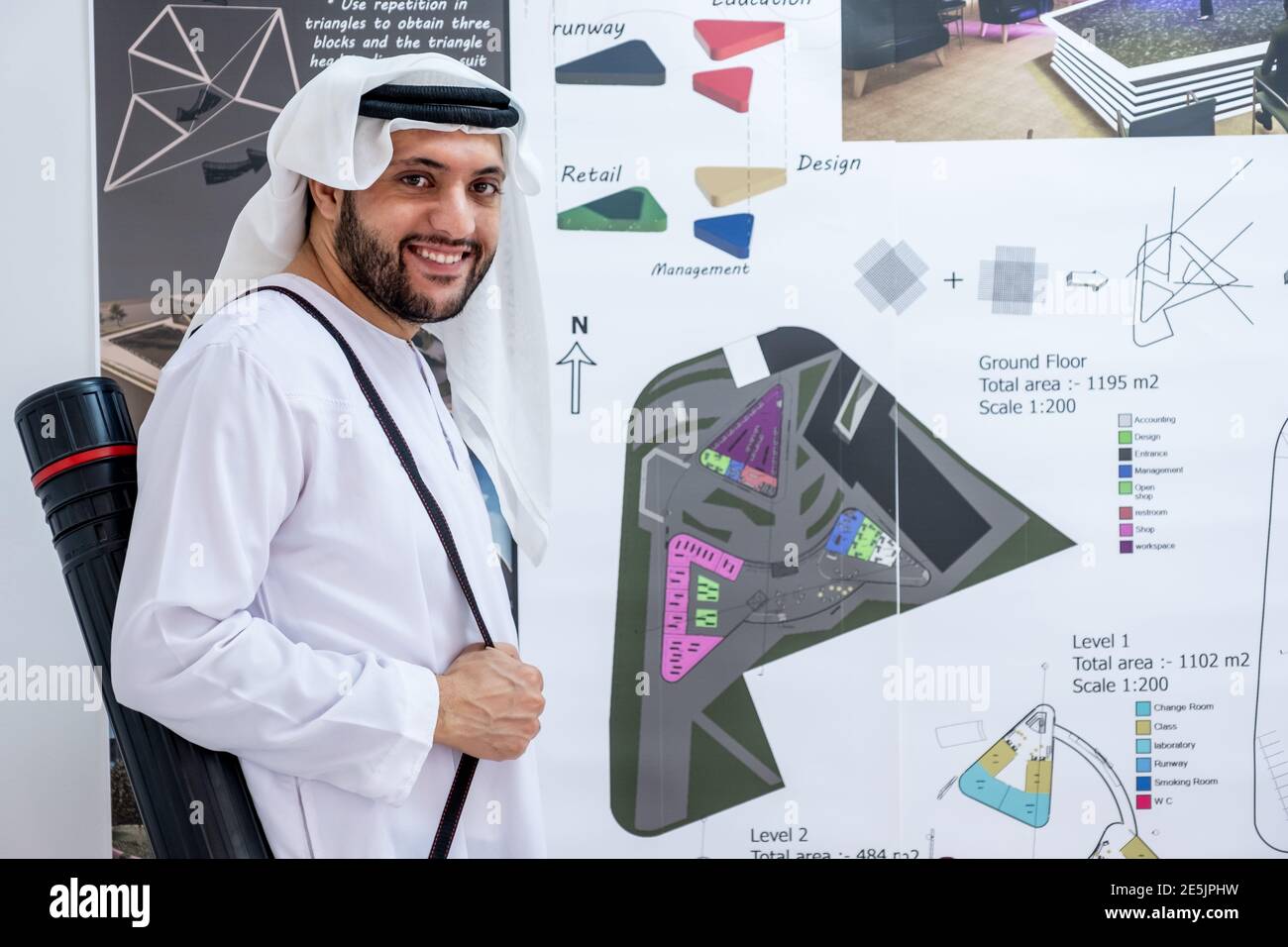 Male arab architect standing beside his project Stock Photo - Alamy