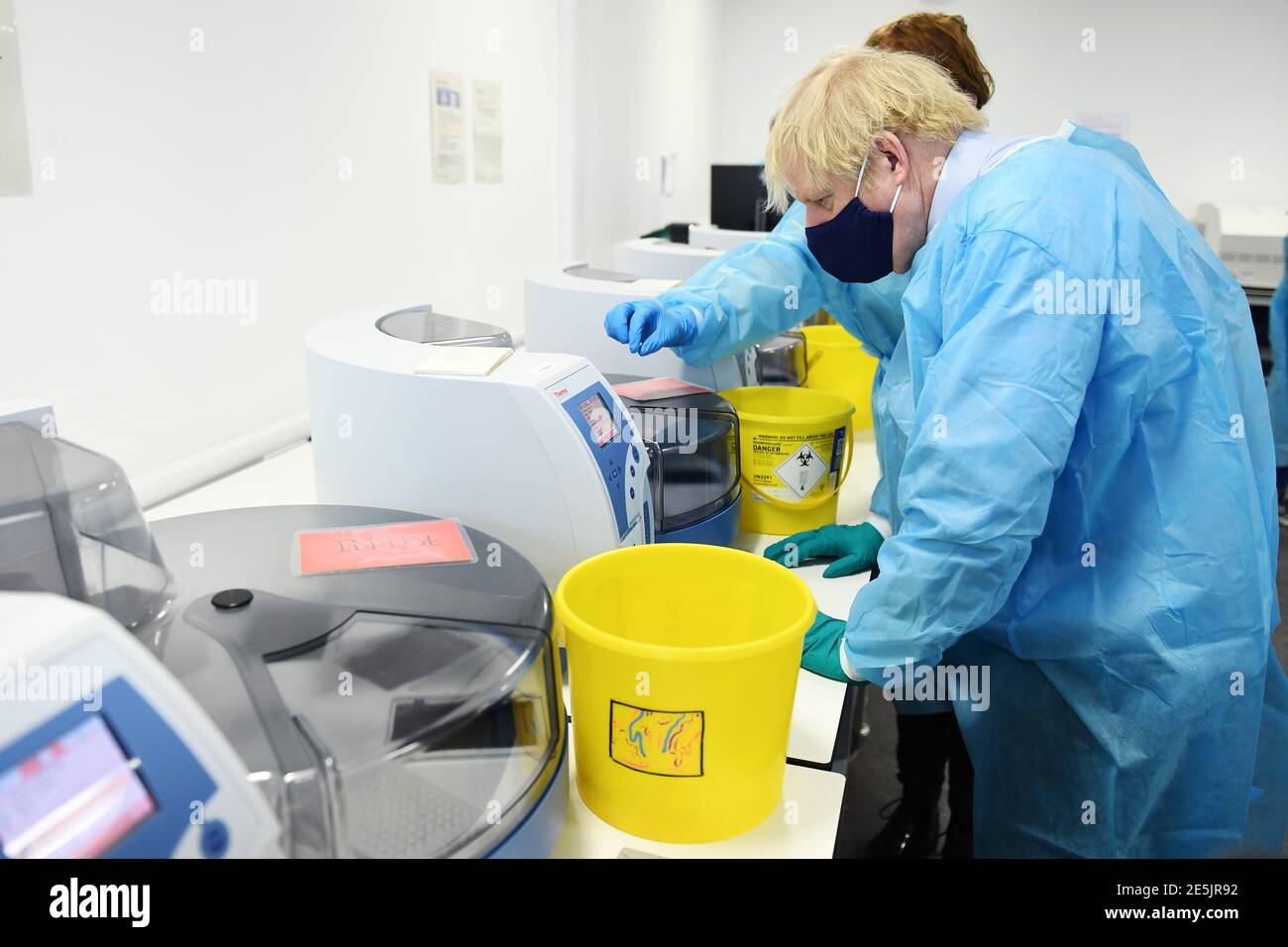 Prime Minister Boris Johnson is shown the Lighthouse Laboratory, used ...