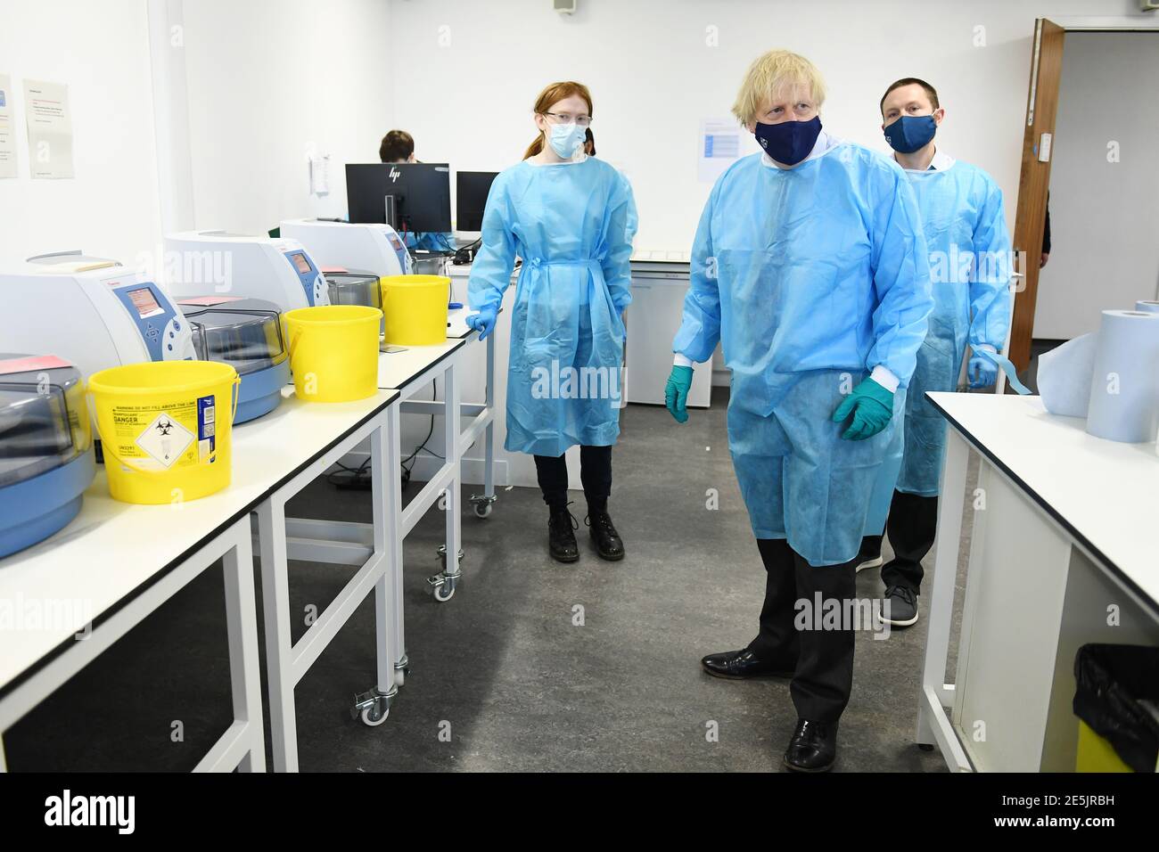 Prime Minister Boris Johnson is shown the Lighthouse Laboratory, used ...