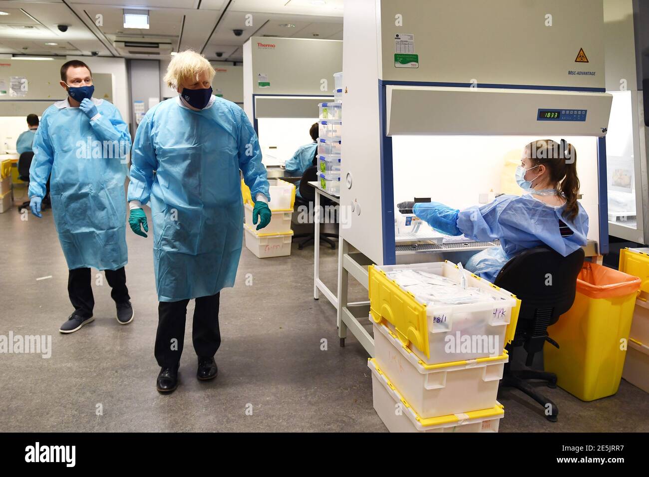 Prime Minister Boris Johnson is shown the Lighthouse Laboratory, used ...