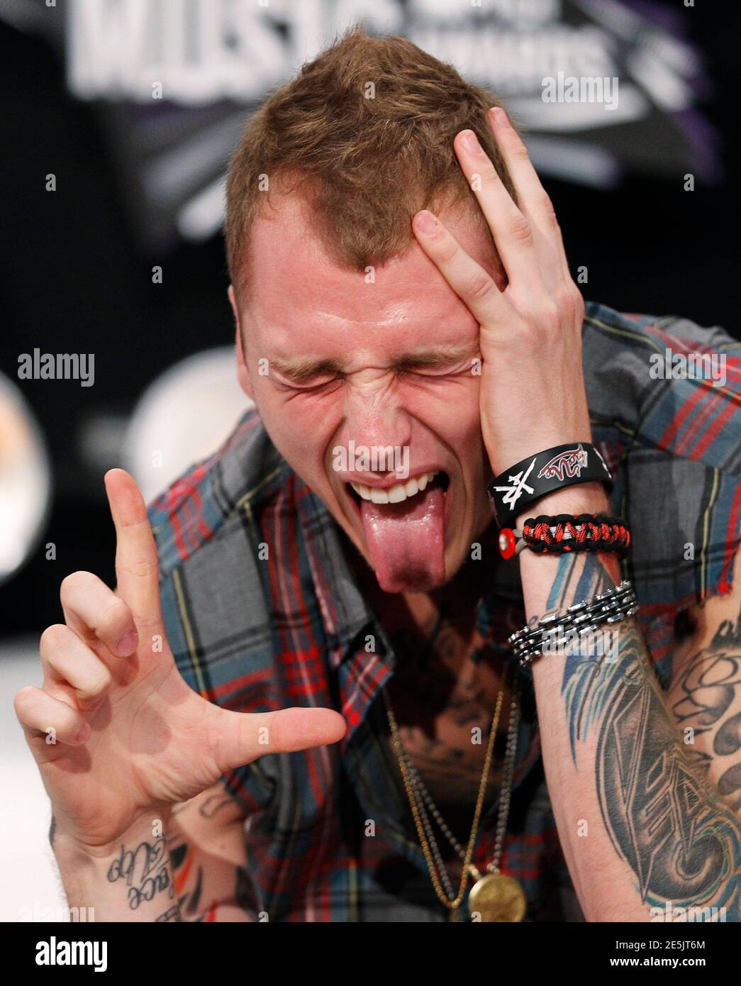Rapper machine gun kelly poses hi-res stock photography and images - Alamy