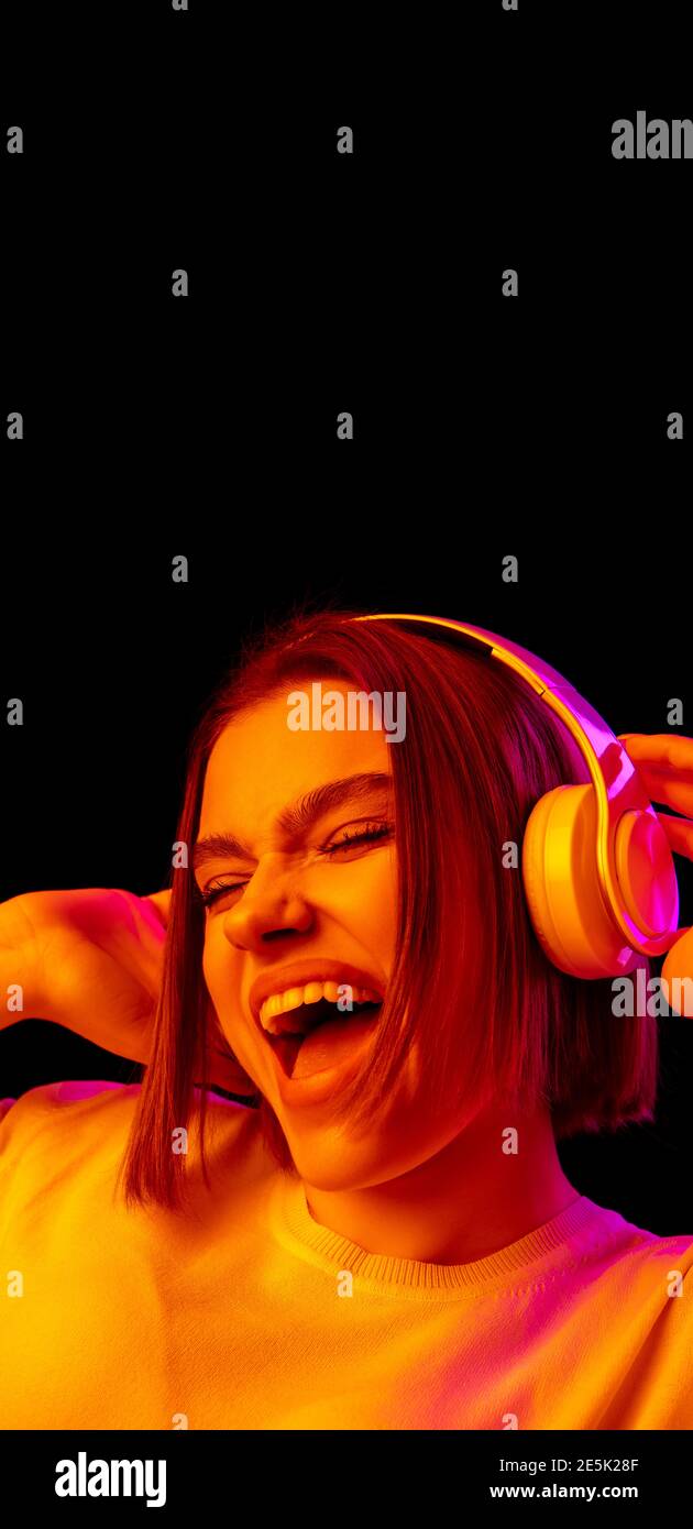 Screaming. Caucasian woman's portrait on black studio background in ...