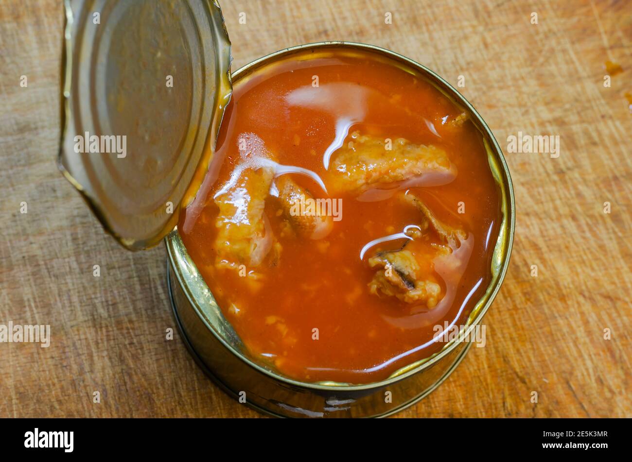 Canned food, shelf life food concept. Close-up of an open can of food ...