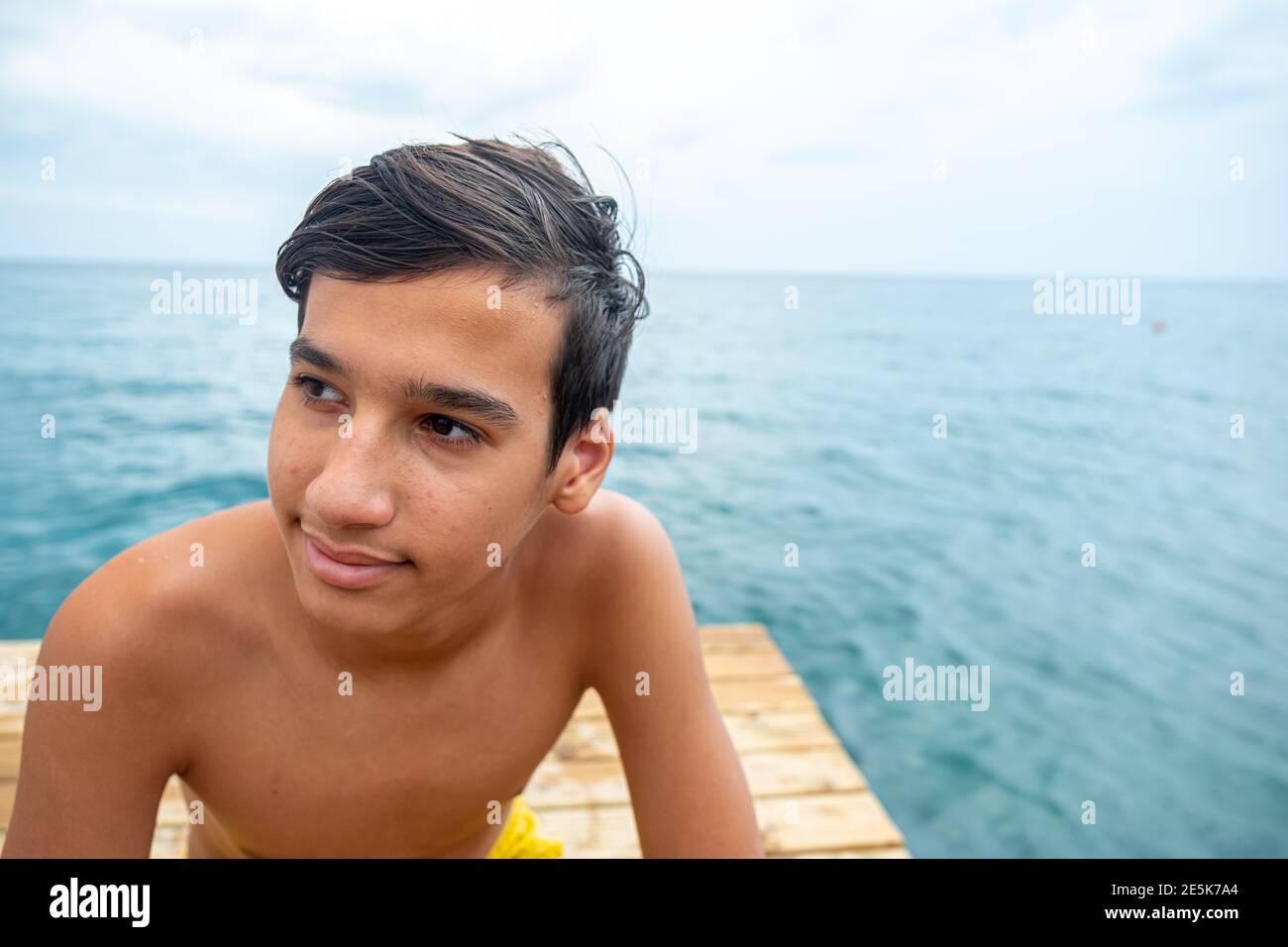 Cheerful handsome arab guy hi-res stock photography and images - Alamy