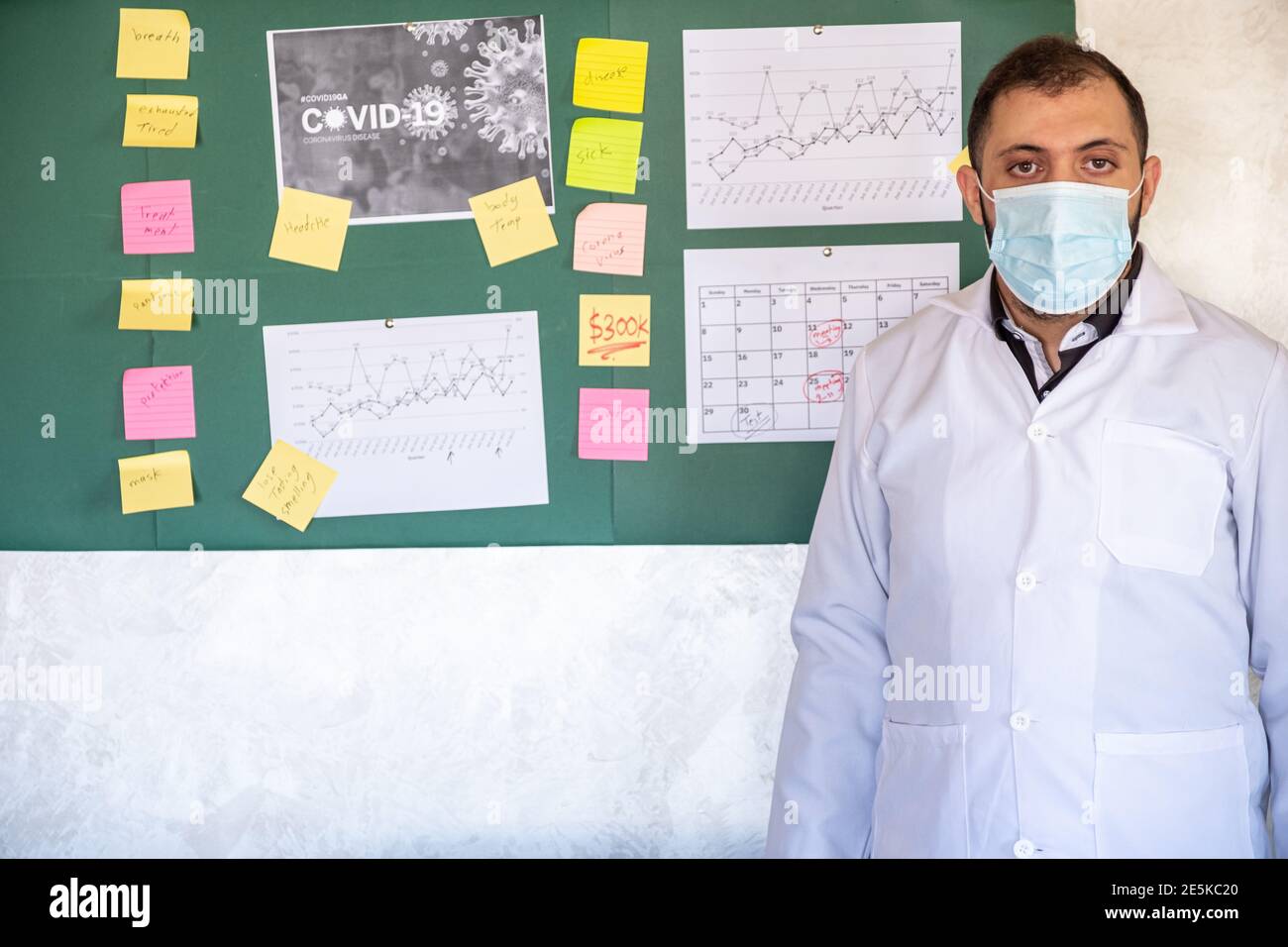 Doctor wearing lab coach jop interview webinar speaker looking at ...