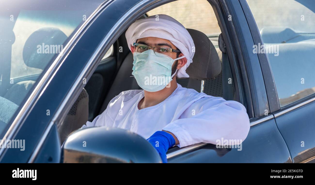 Arab man driving a car in the pandamic Stock Photo - Alamy