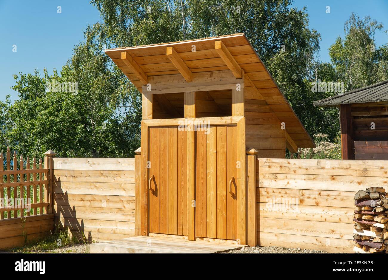 Wooden ecological toilet in the village. general sanitary unit Stock ...