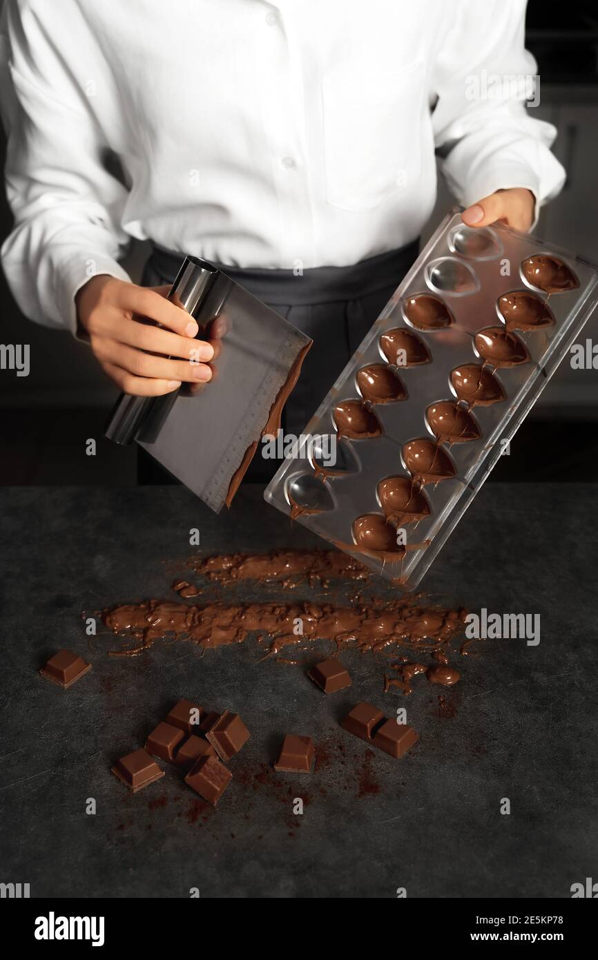 Woman making chocolate truffle hi-res stock photography and images - Alamy
