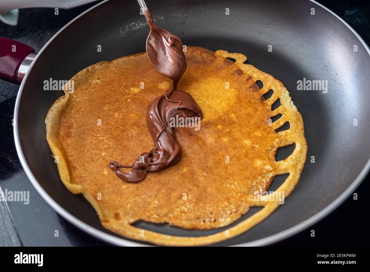 Making delicious crebe in a pan Stock Photo - Alamy