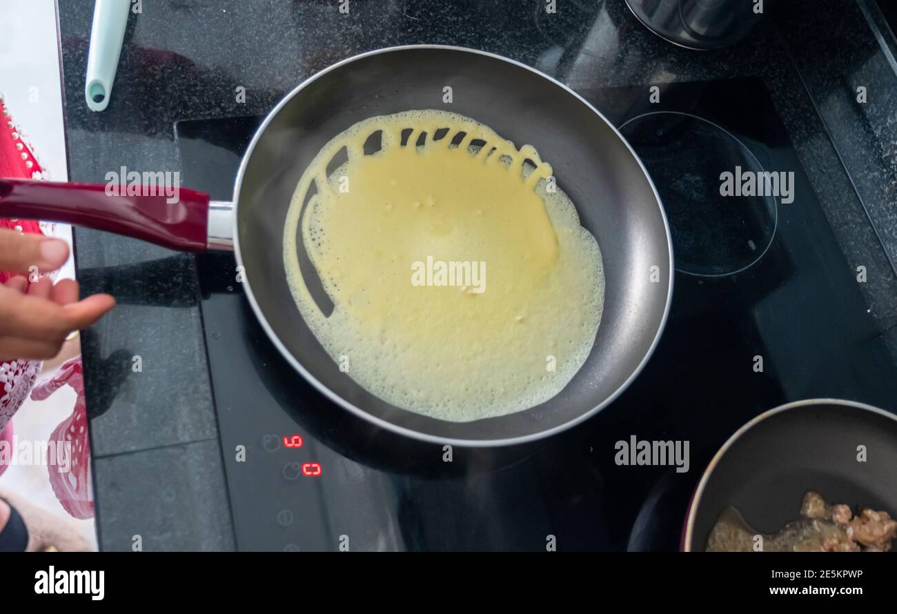 Making delicious crebe in a pan Stock Photo - Alamy