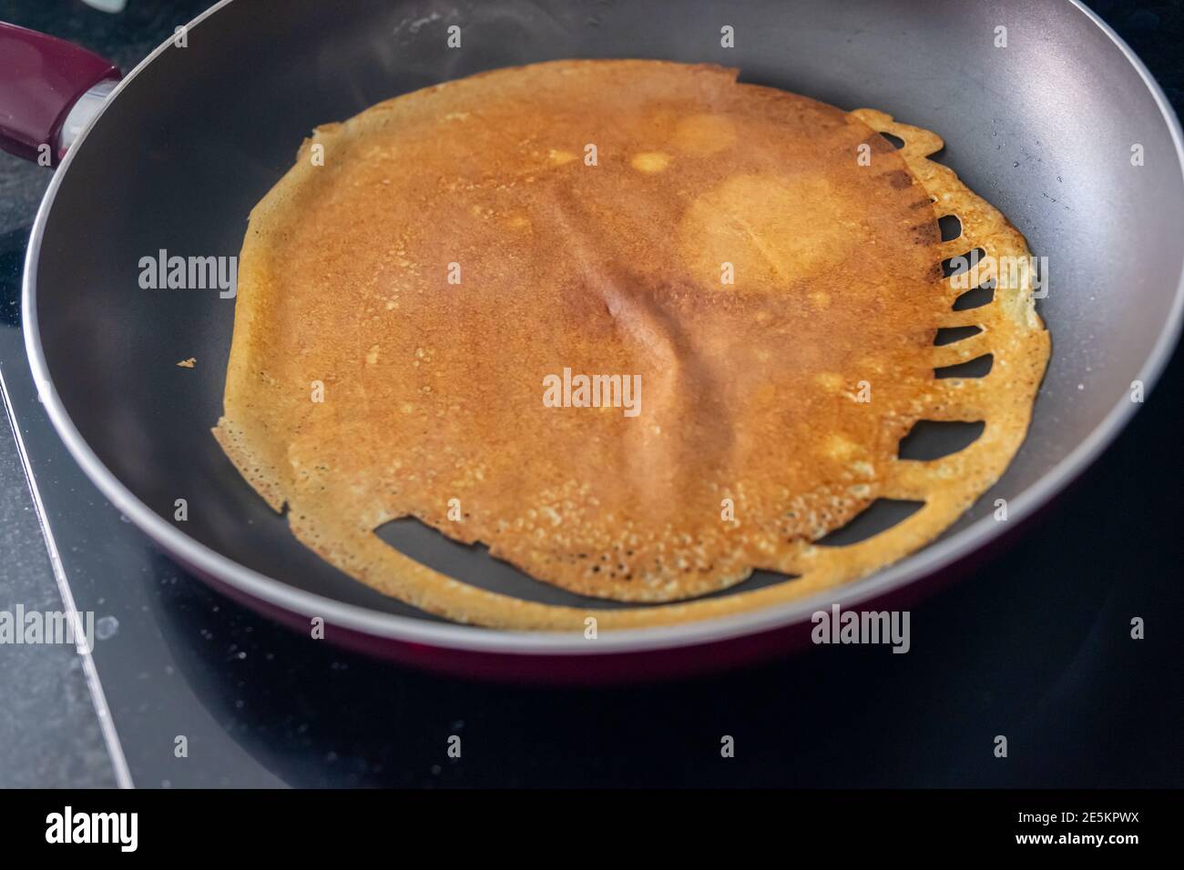 Making delicious crebe in a pan Stock Photo - Alamy