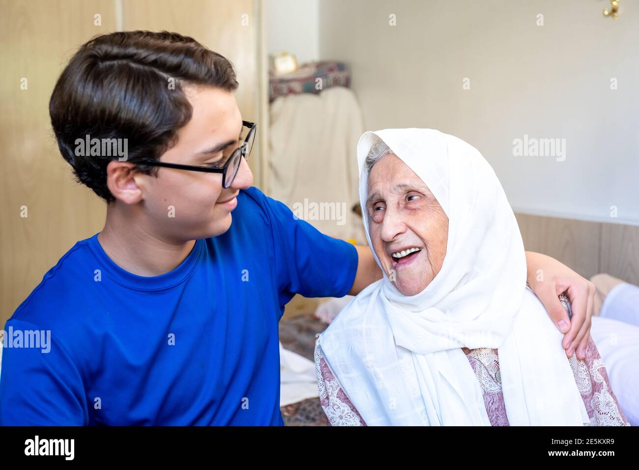 Lovely boy and grandmother together Stock Photo - Alamy