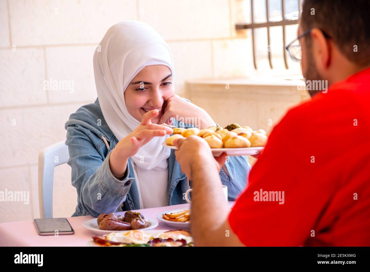 Couples are eating breakfast together Stock Photo - Alamy