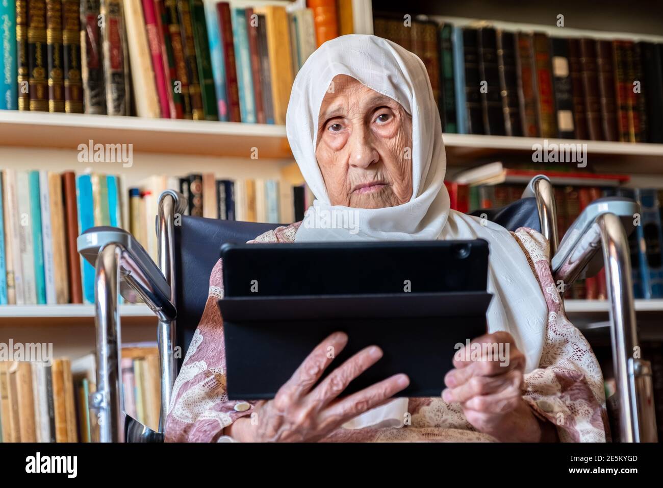 Old woman is using technology Stock Photo - Alamy