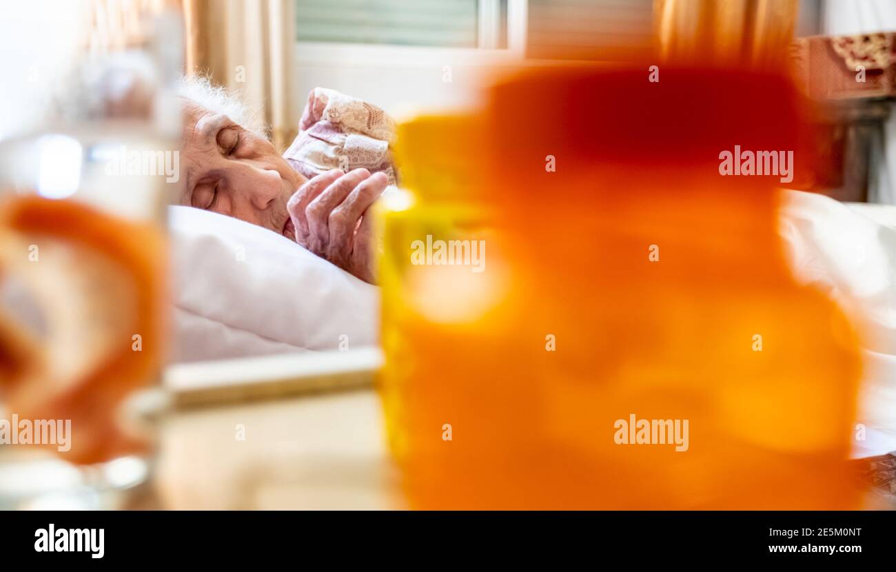 Old woman feels so sick Stock Photo - Alamy