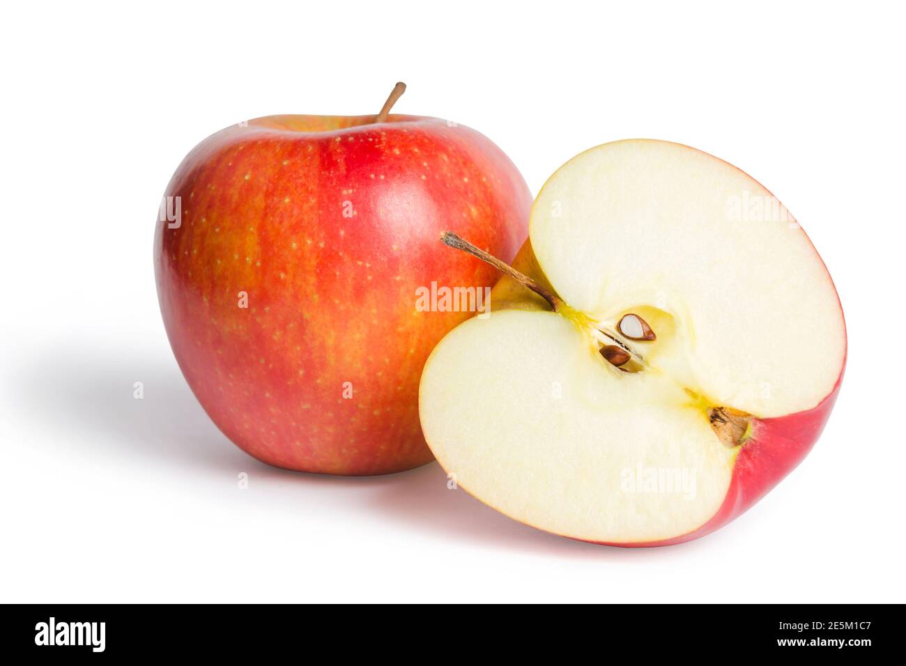Red apple with one cutted on half isolated on white background Stock ...