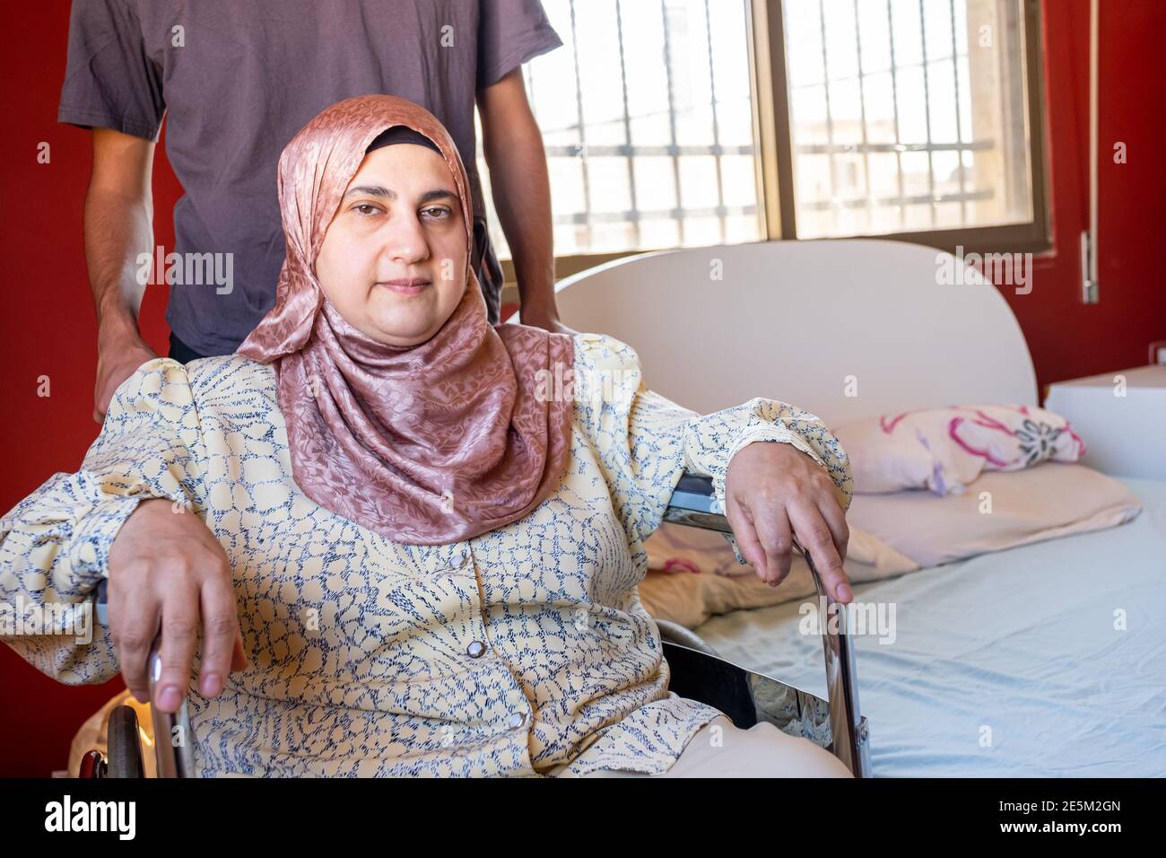 Muslim woman with disability and her beloved son Stock Photo - Alamy