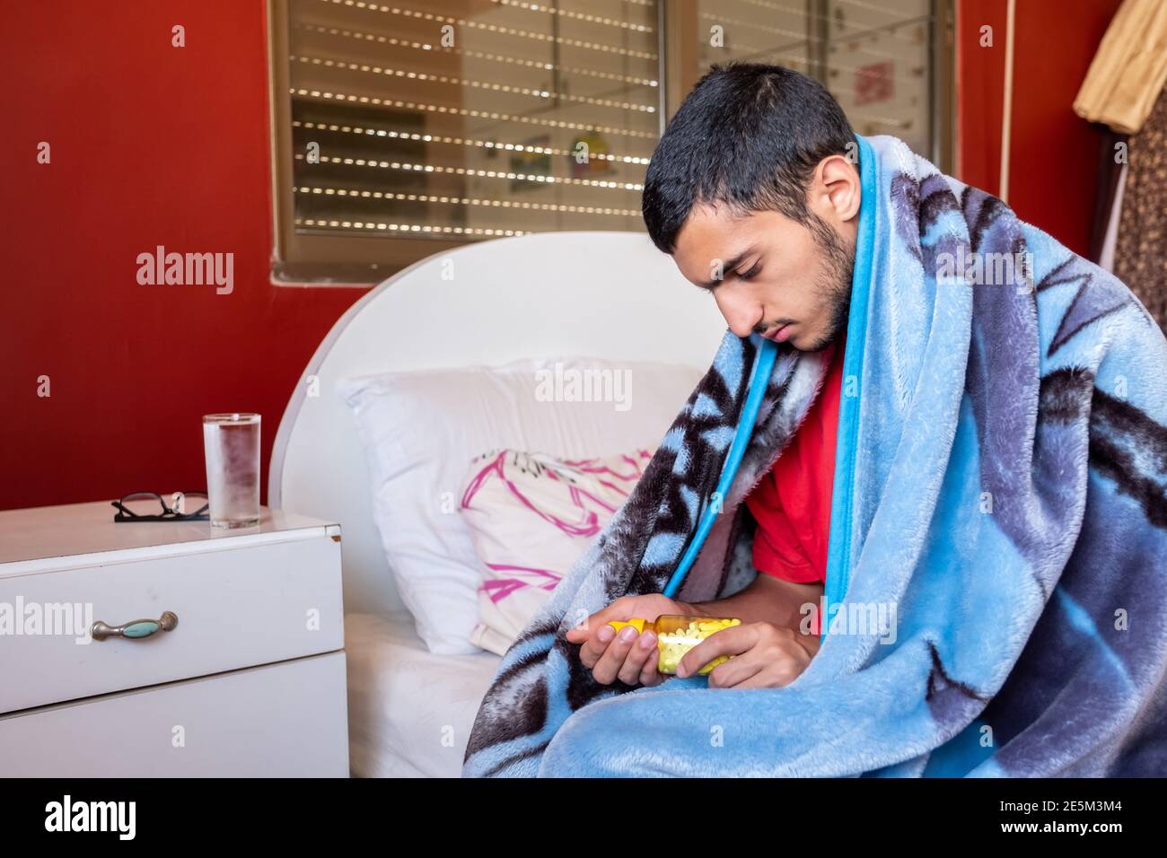 Man shivering in bed hi-res stock photography and images - Alamy