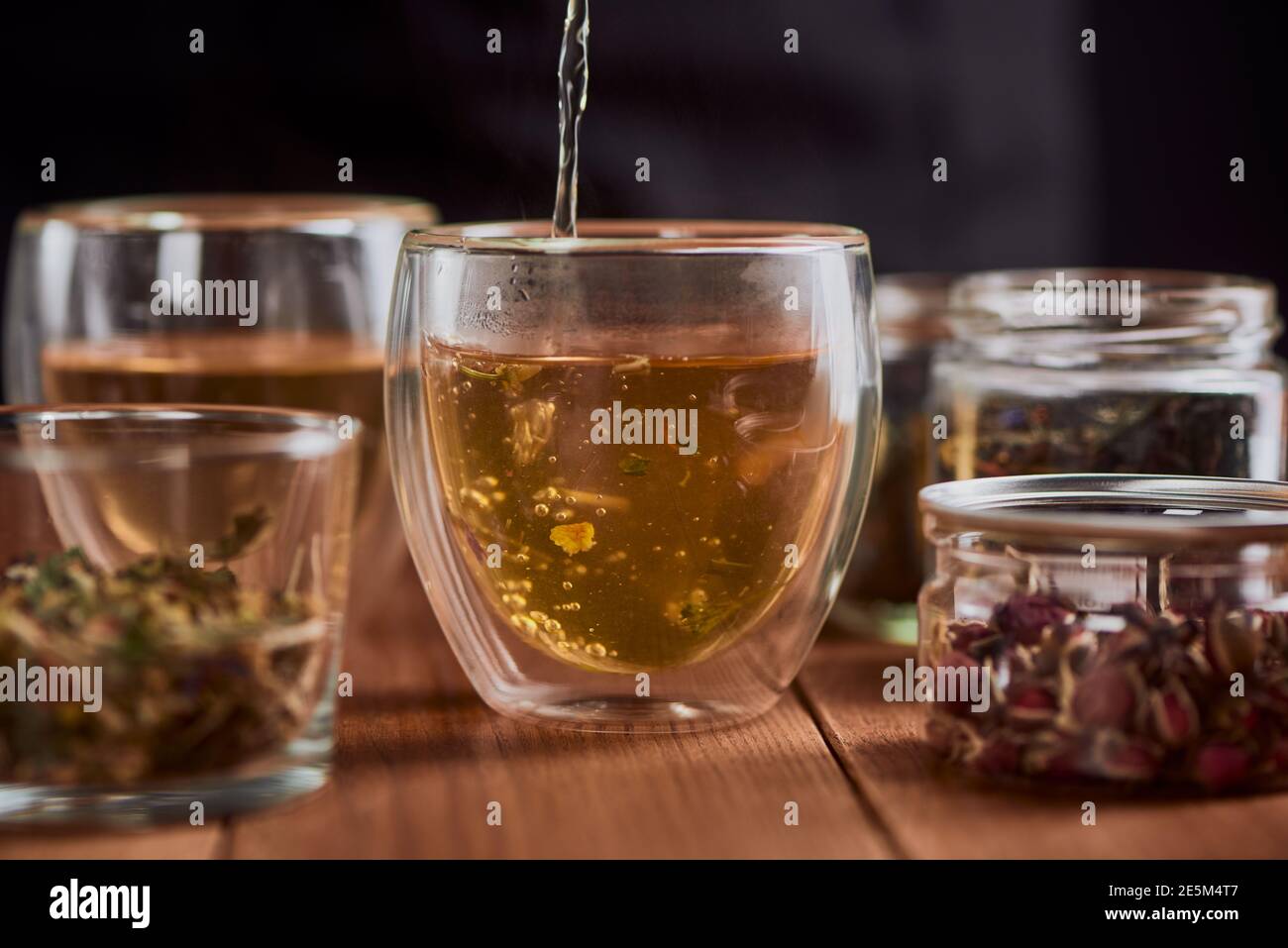 Tea being poured into a tea cup hi-res stock photography and images - Alamy