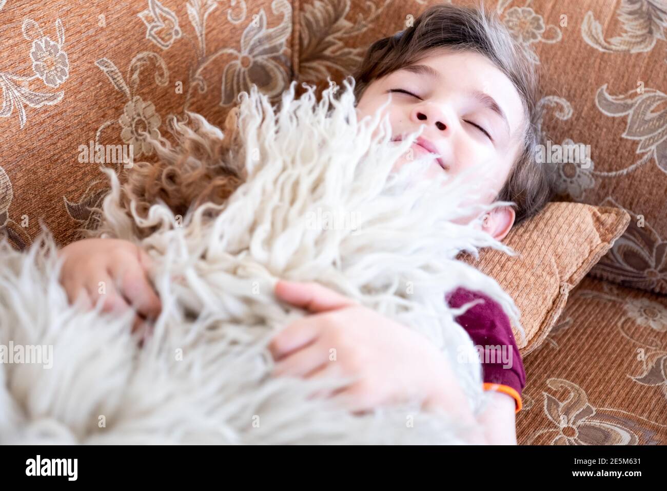 Little boy having a quick nap Stock Photo - Alamy