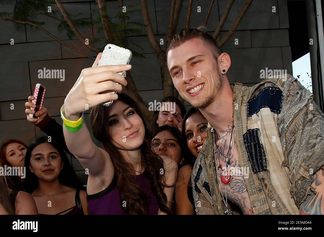 Rapper machine gun kelly poses hi-res stock photography and images - Alamy