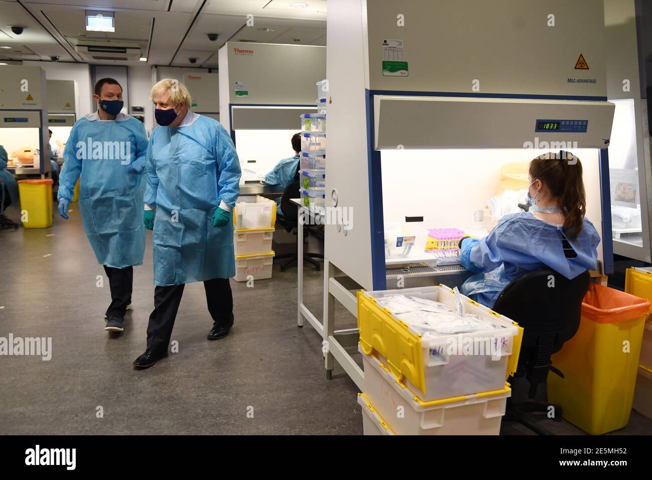 Prime Minister Boris Johnson is shown the Lighthouse Laboratory, used ...