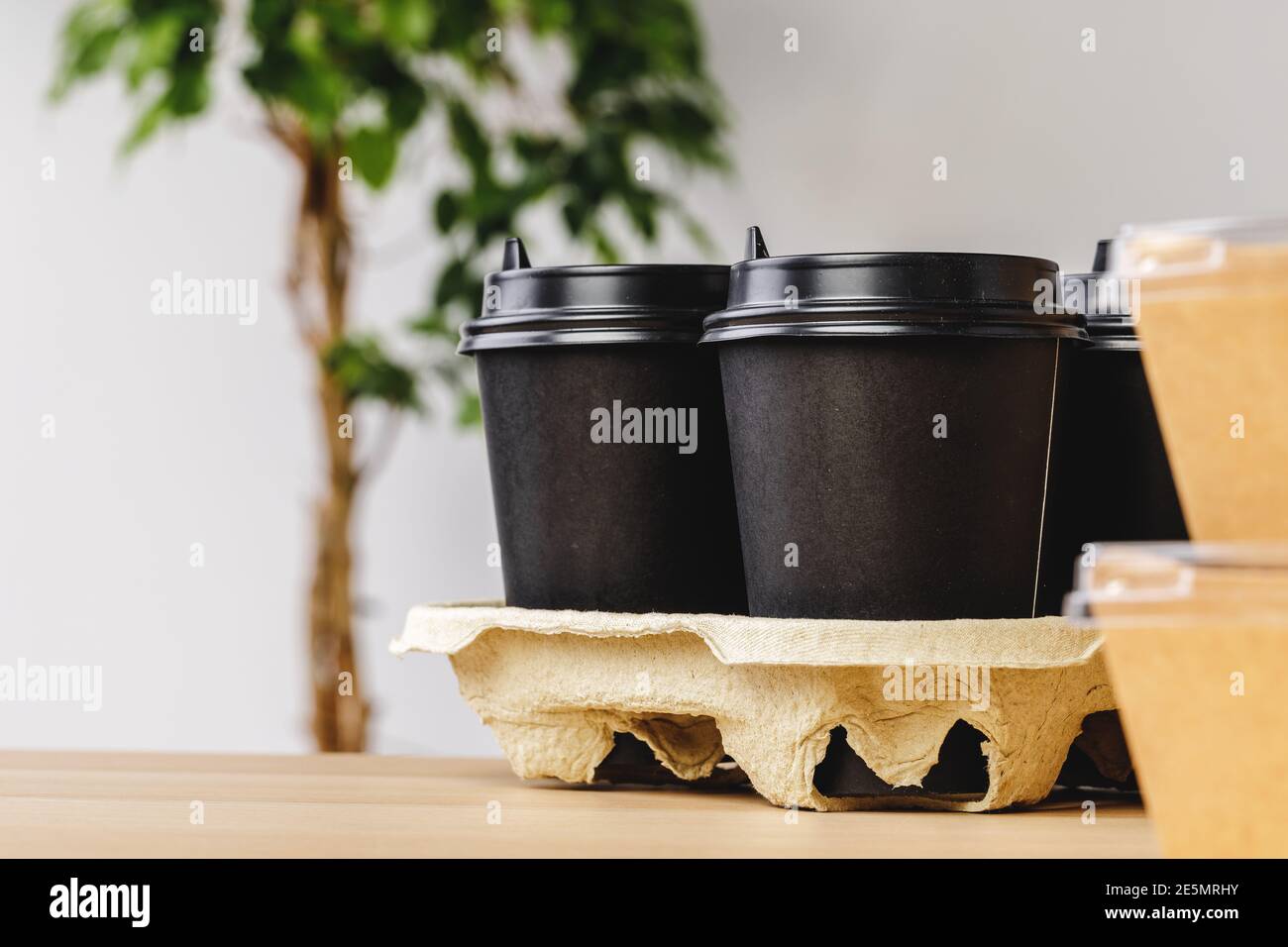 Assortment of various food delivery containers on table Stock Photo - Alamy