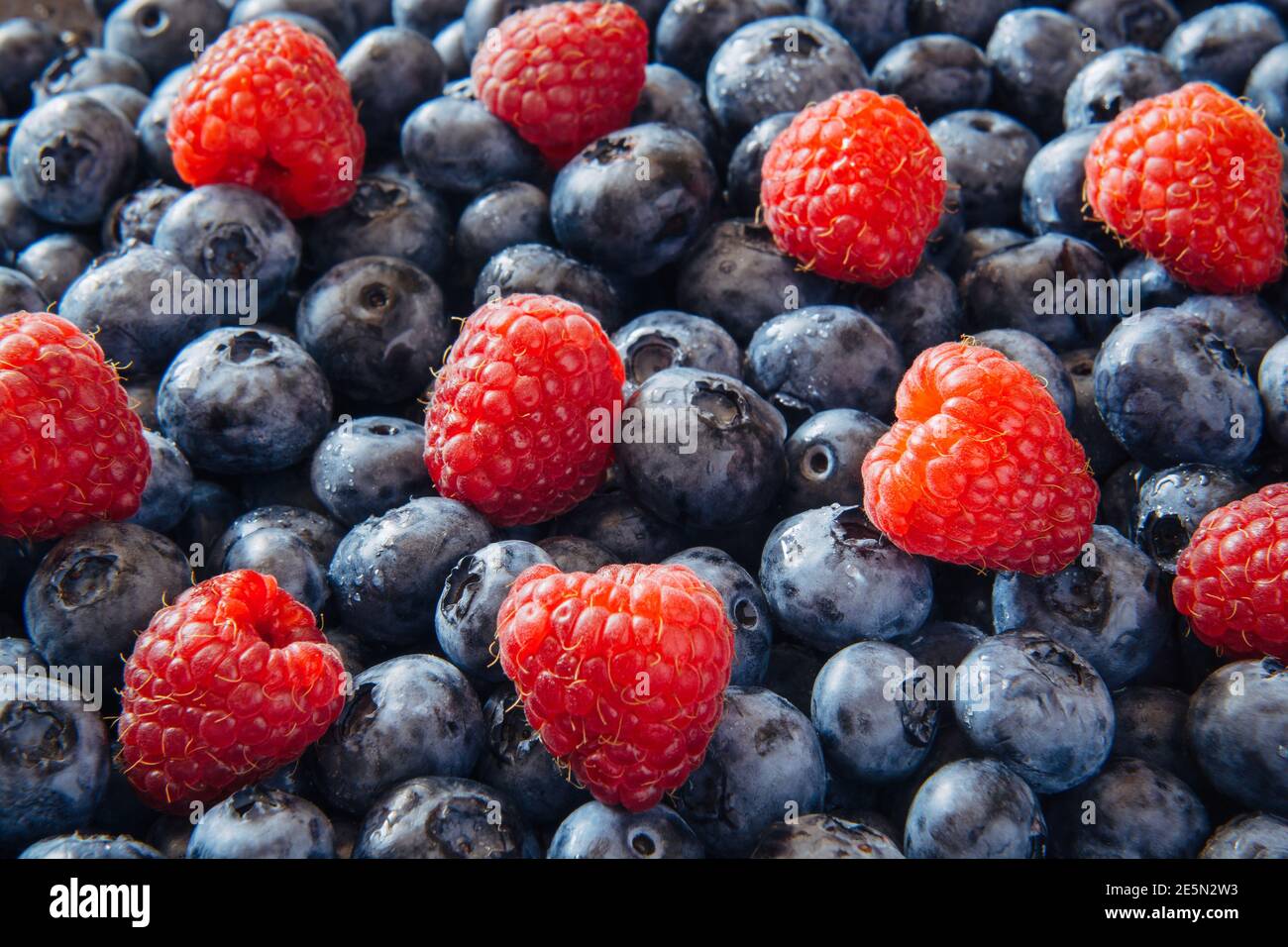 Healthy mixed fruit and ingredients with raspberry, blueberry from top ...