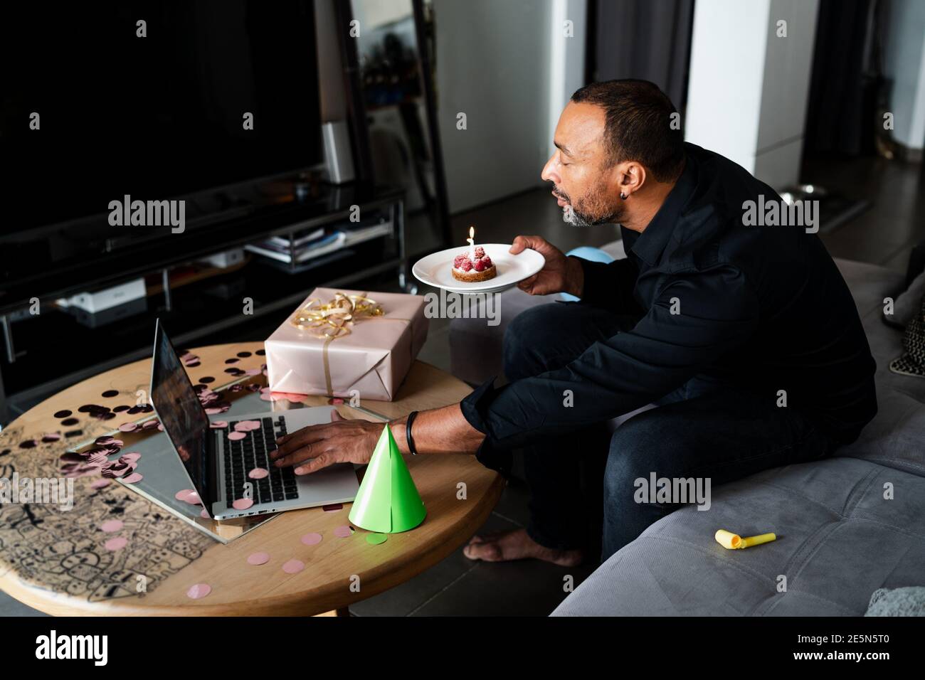 Handsome 40 years old man blowing candles on his birthday cake Stock ... Handsome 40 years old man blowing candles on his birthday cake Stock ...