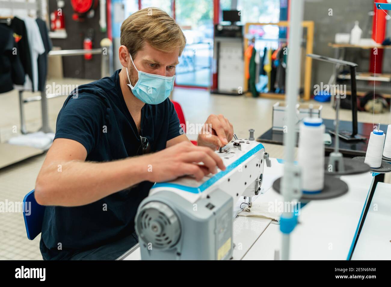 Factory worker wearing a protective mask Stock Photo - Alamy