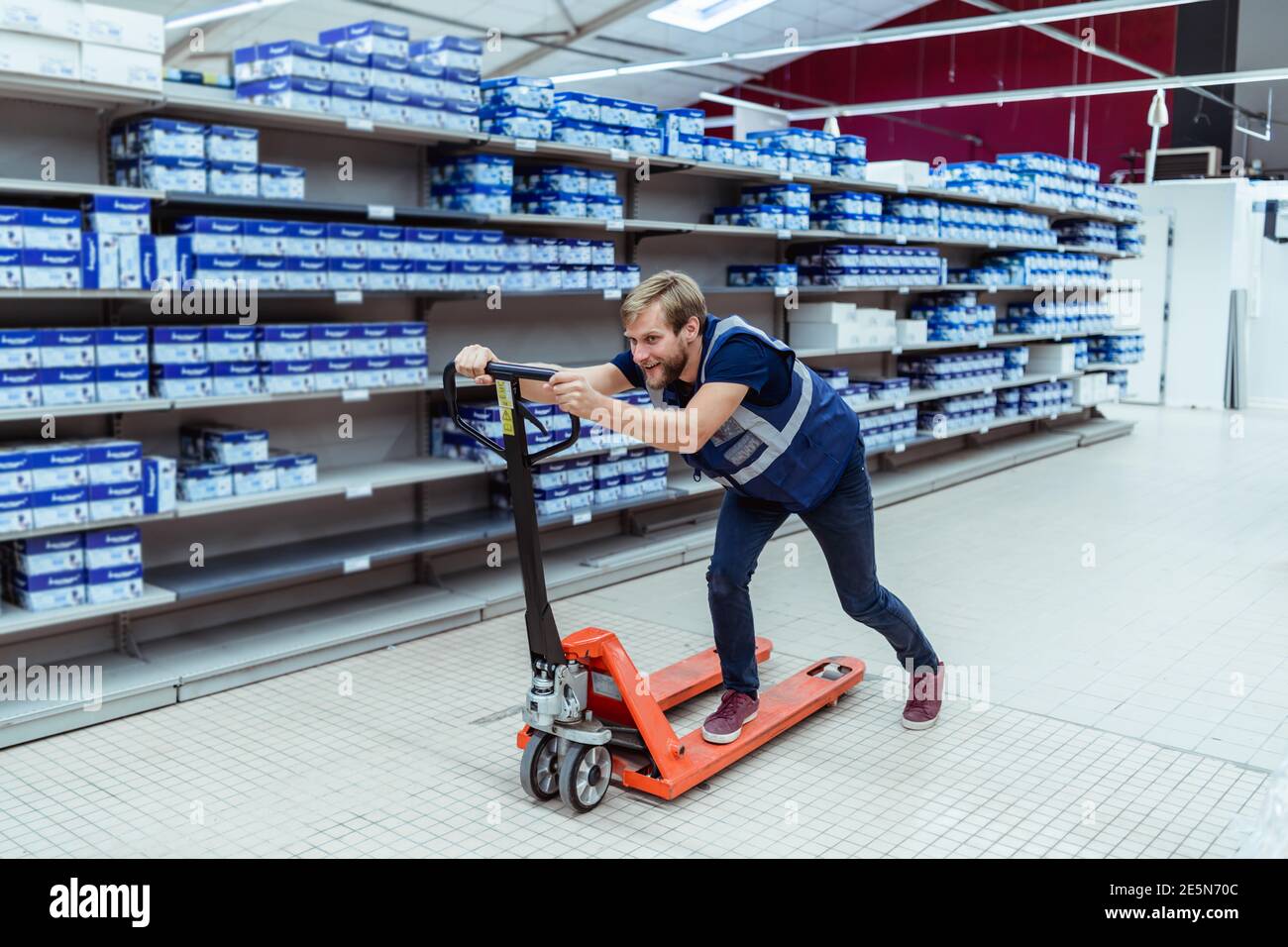 Employee having fun at work Stock Photo - Alamy